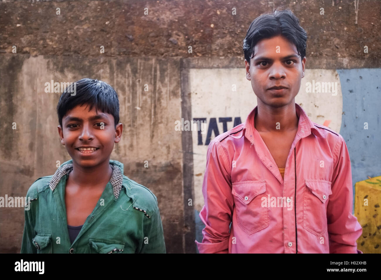 MUMBAI, INDIA - 12 JANUARY 2015: Young Indian men in Dharavi slum Stock ...