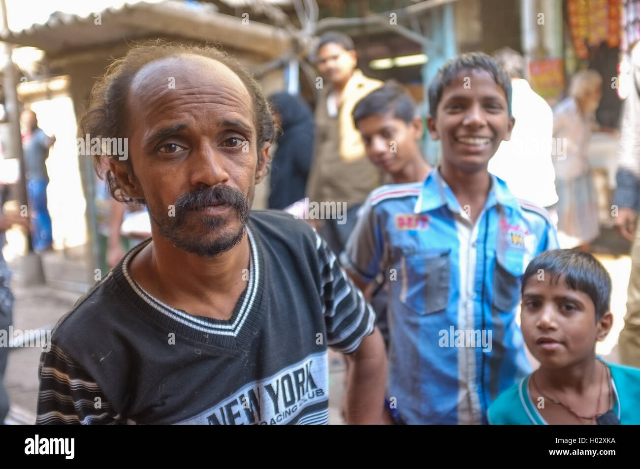 MUMBAI, INDIA - 12 JANUARY 2015: Portrait of a man in Dharavi slum, the ...