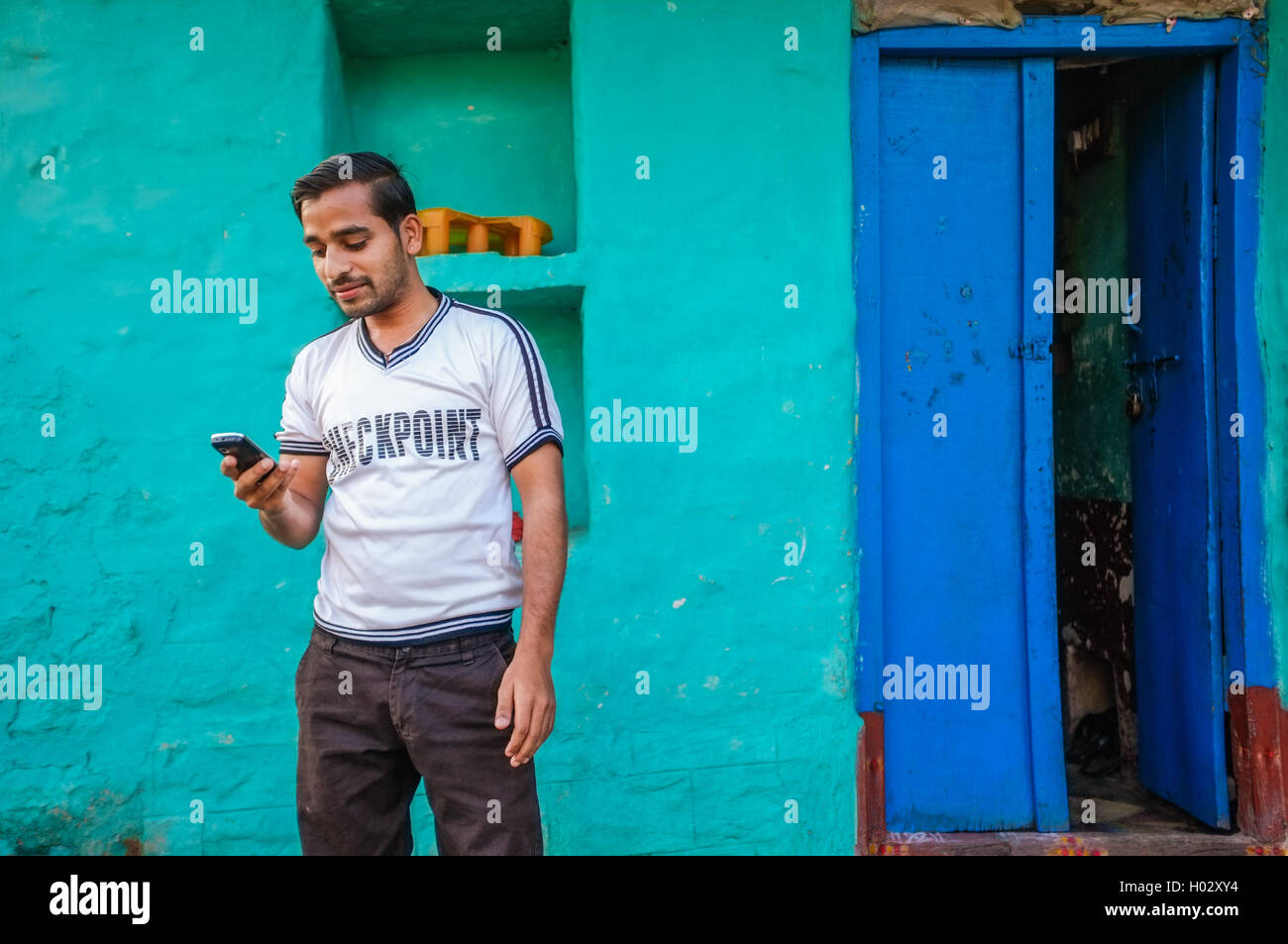 KAMALAPURAM, INDIA - 02 FEBRUARY 2015: Indian man looking at this ...