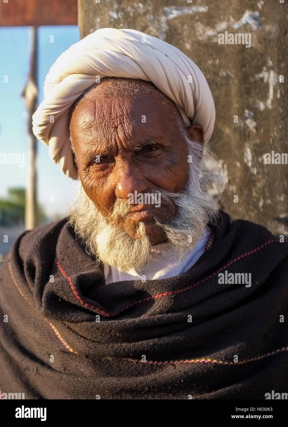 GODWAR REGION, INDIA - 14 FEBRUARY 2015: Elderly tribesman with white ...