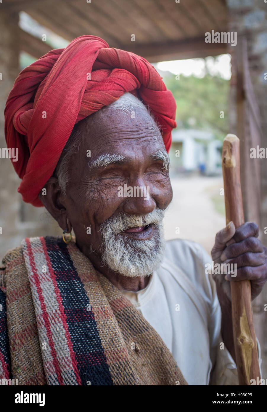 Old indian man walking stick hi-res stock photography and images - Alamy