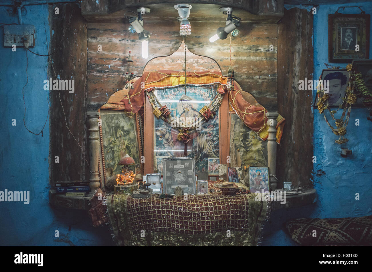 JODHPUR, INDIA - 17 FEBRUARY 2015: Small shiva temple on wall of room ...