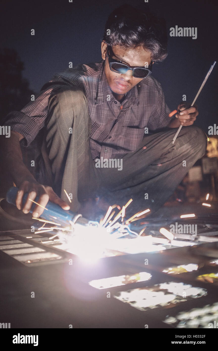 Indian welder hi-res stock photography and images - Alamy