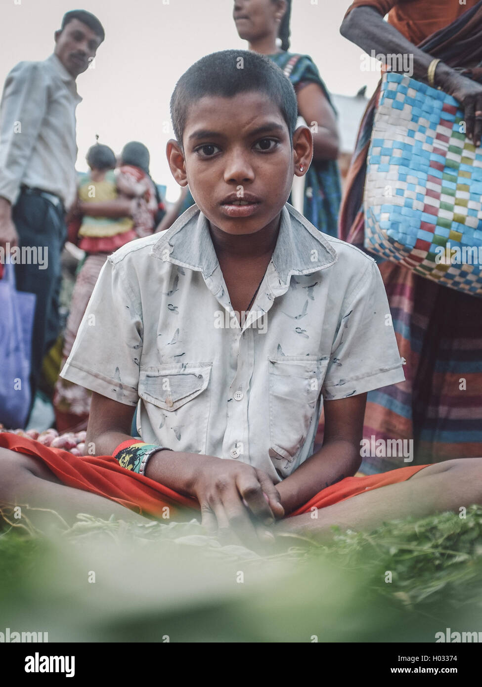 Indian boy selling at market hi-res stock photography and images - Alamy