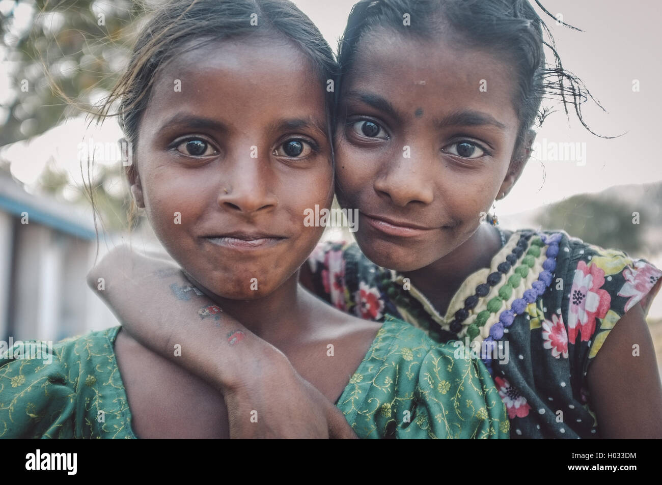 HAMPI, INDIA - 31 JANUARY 2015: Two Indian girls hug and smile. Post ...