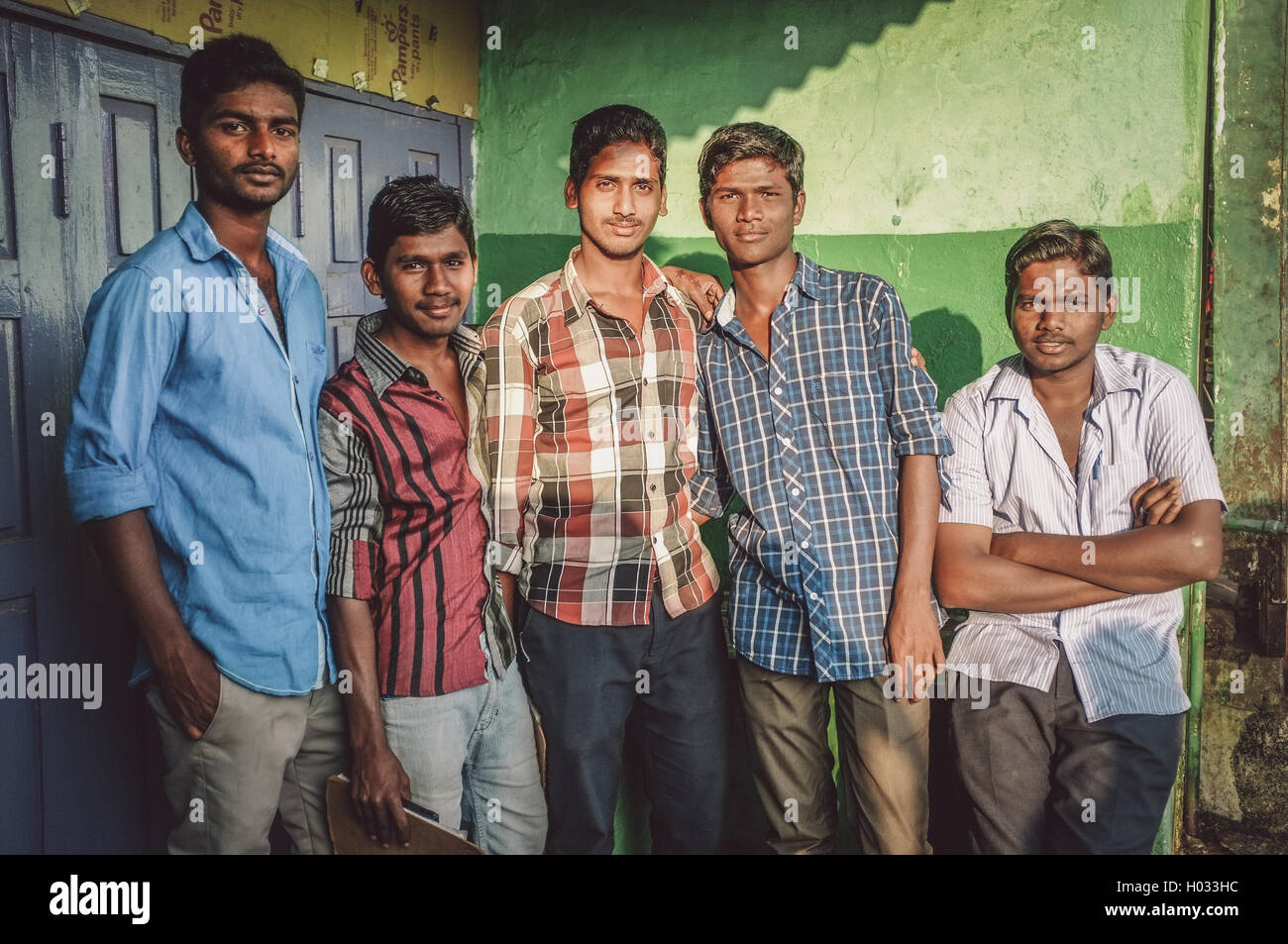 KAMALAPURAM, INDIA - 02 FABRUARY 2015: Young Indian men in a town close ...