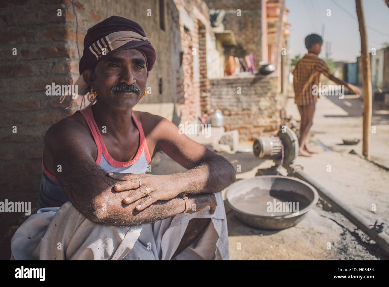 GODWAR REGION, INDIA - 14 FEBRUARY 2015: Mechanic with mustache wearing ...