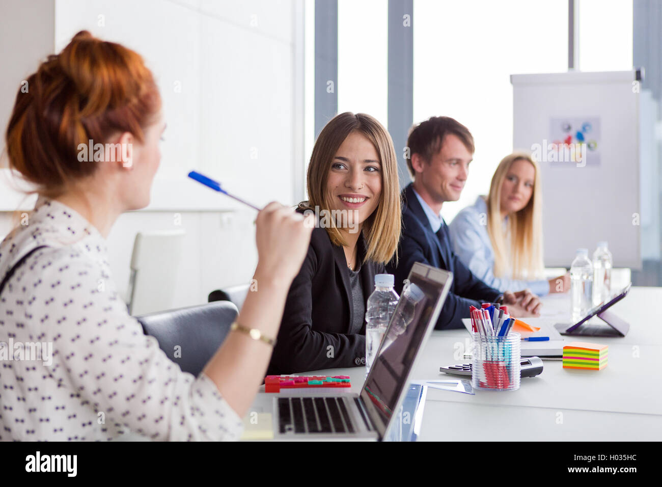 Business women discussing project during the meeting in modern office ...