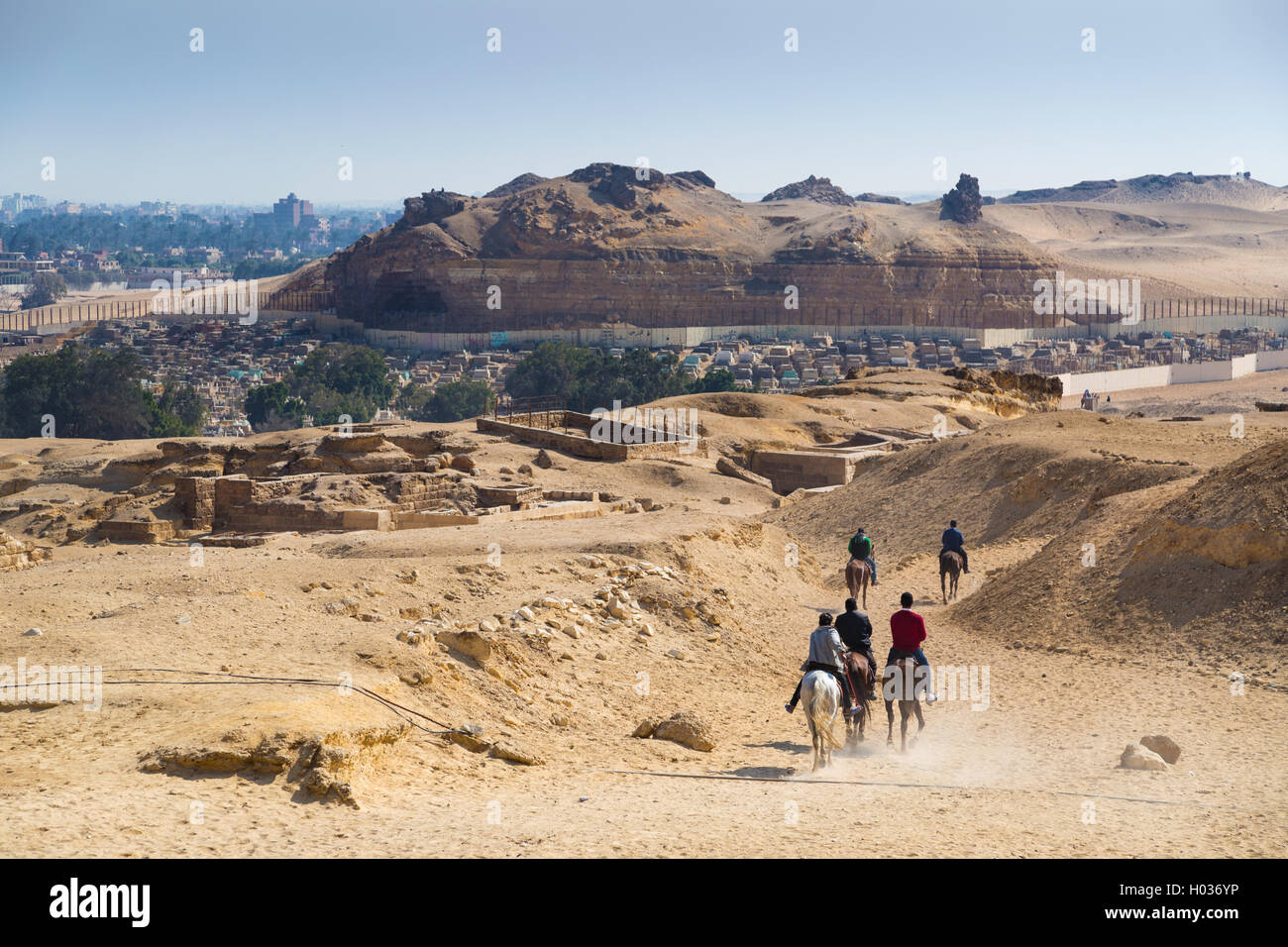 Egyptian tourists riding horses near Great pyramid of Giza, Egypt Stock ...