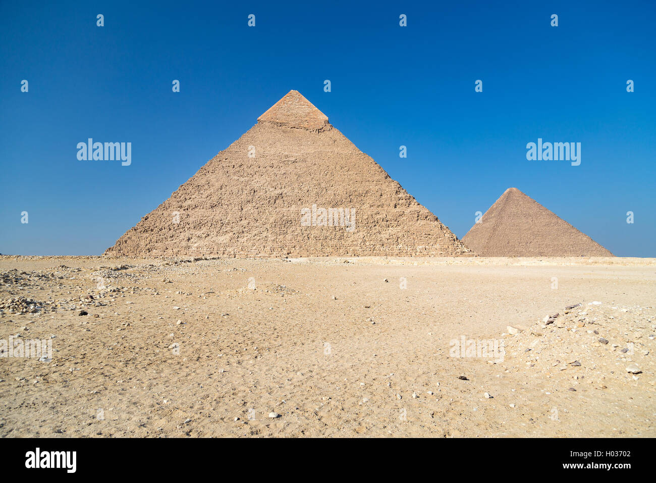 Pyramids of Giza complex ( Egypt) against the clear blue sky Stock ...