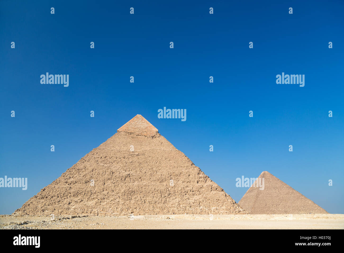 Pyramids of Giza complex ( Egypt) against the clear blue sky Stock ...