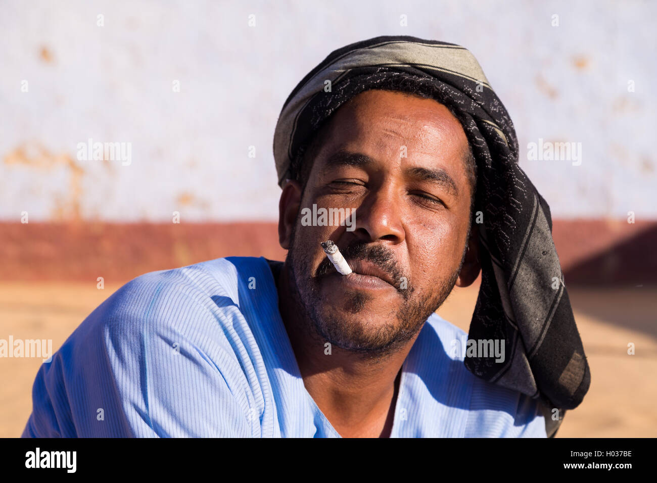 Man smoking cigarette africa hi-res stock photography and images - Alamy