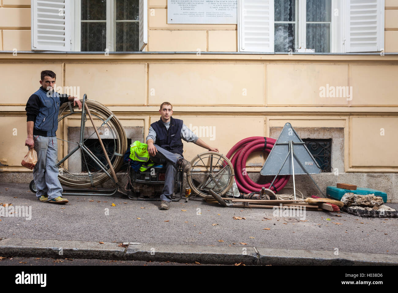 ZAGREB, CROATIA - OCTOBER 14, 2013: Construction workers taking a break ...