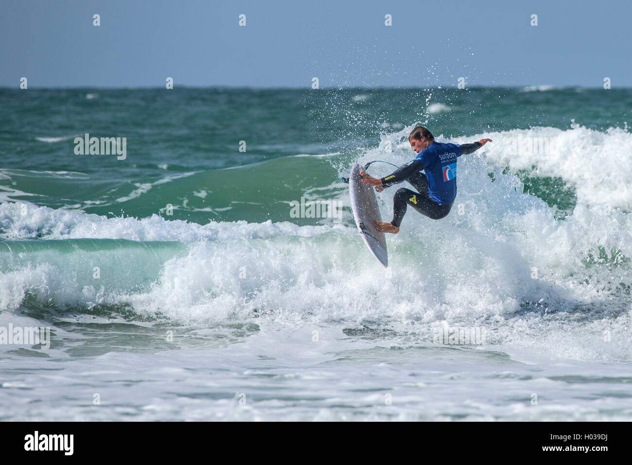 A competitor in spectacular surfing action at the Surfing GB Inter ...