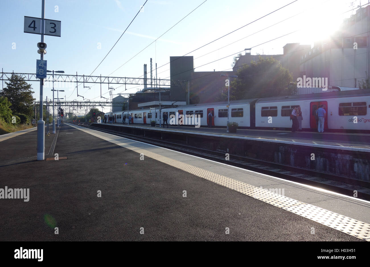 Witham railway station platform and train Stock Photo - Alamy