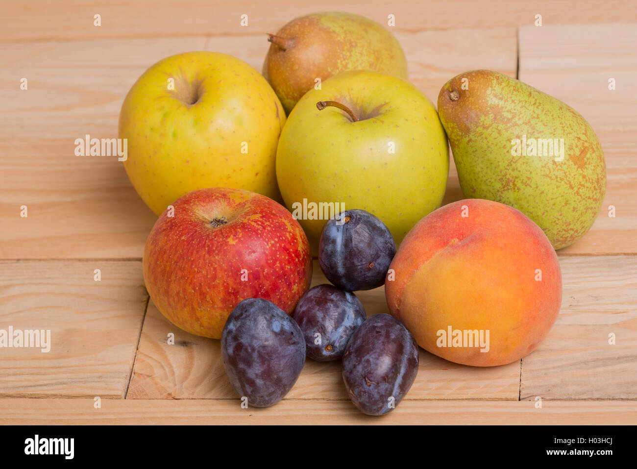 fruits on wooden table, studio picture Stock Photo - Alamy