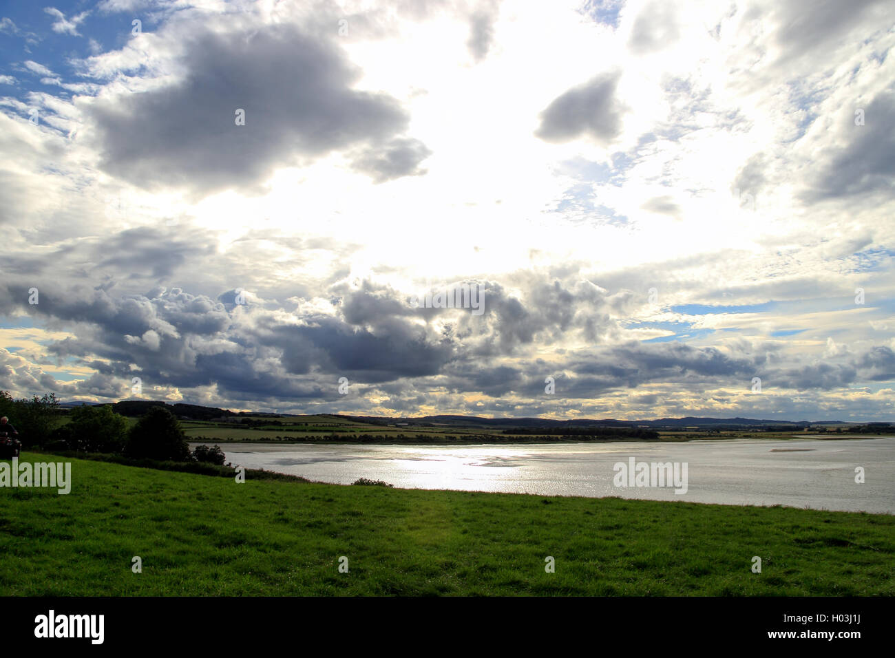 Cloudy sky over the Northumberland coast, near Holy Island, Northeast ...