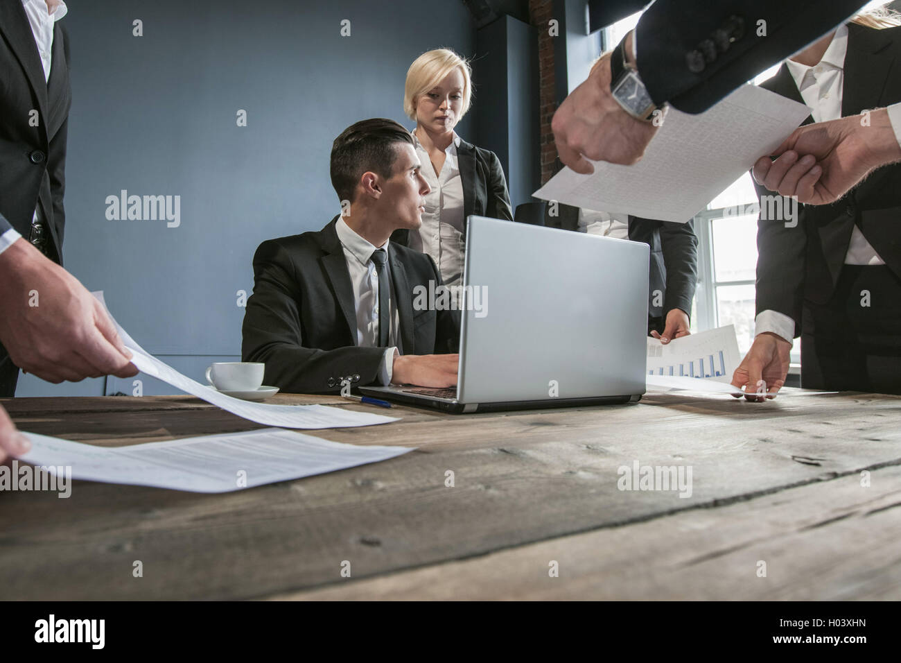 Business man getting extra work hi-res stock photography and images - Alamy