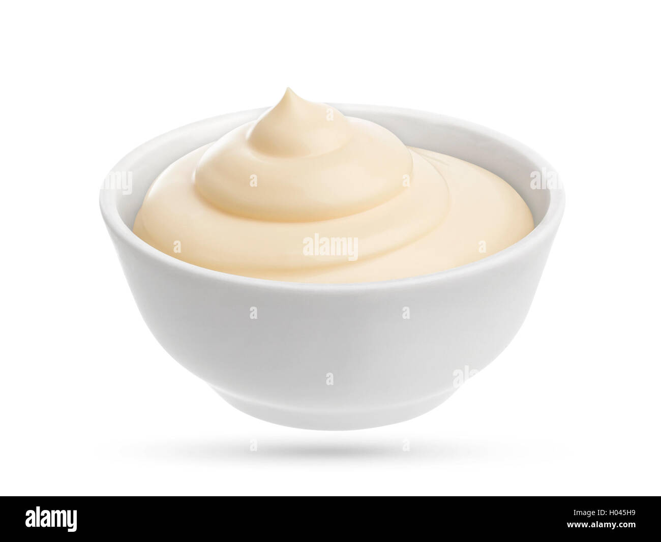 Mayonnaise in small bowl isolated on white background Stock Photo - Alamy