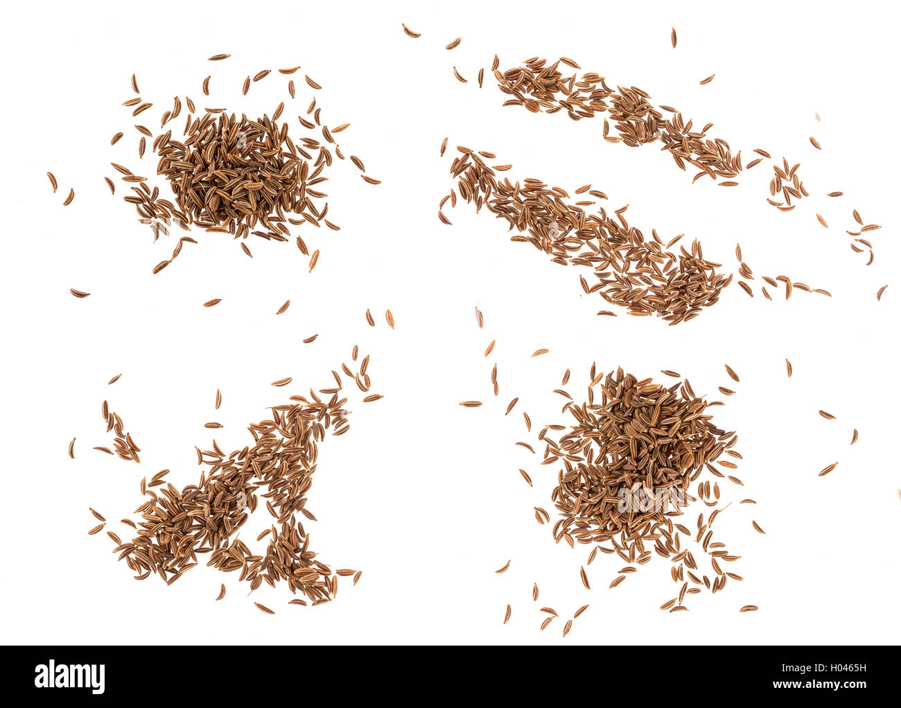 Cumin seeds isolated on white background Stock Photo - Alamy