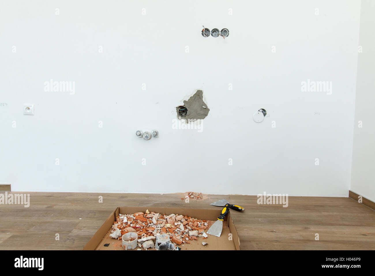 Reconstruction of a new apartment. Remodeling electrical outlets Stock ...