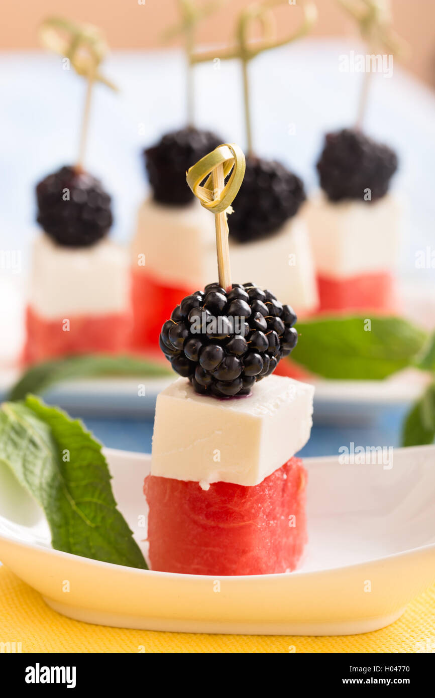 Watermelon cheese blackberry appetizers Stock Photo - Alamy