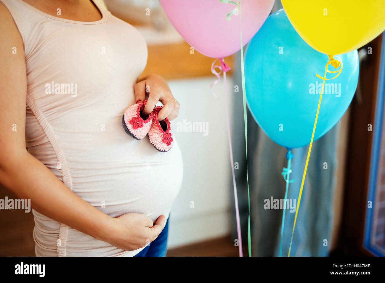 Happy pregnant woman expecting a girl Stock Photo - Alamy