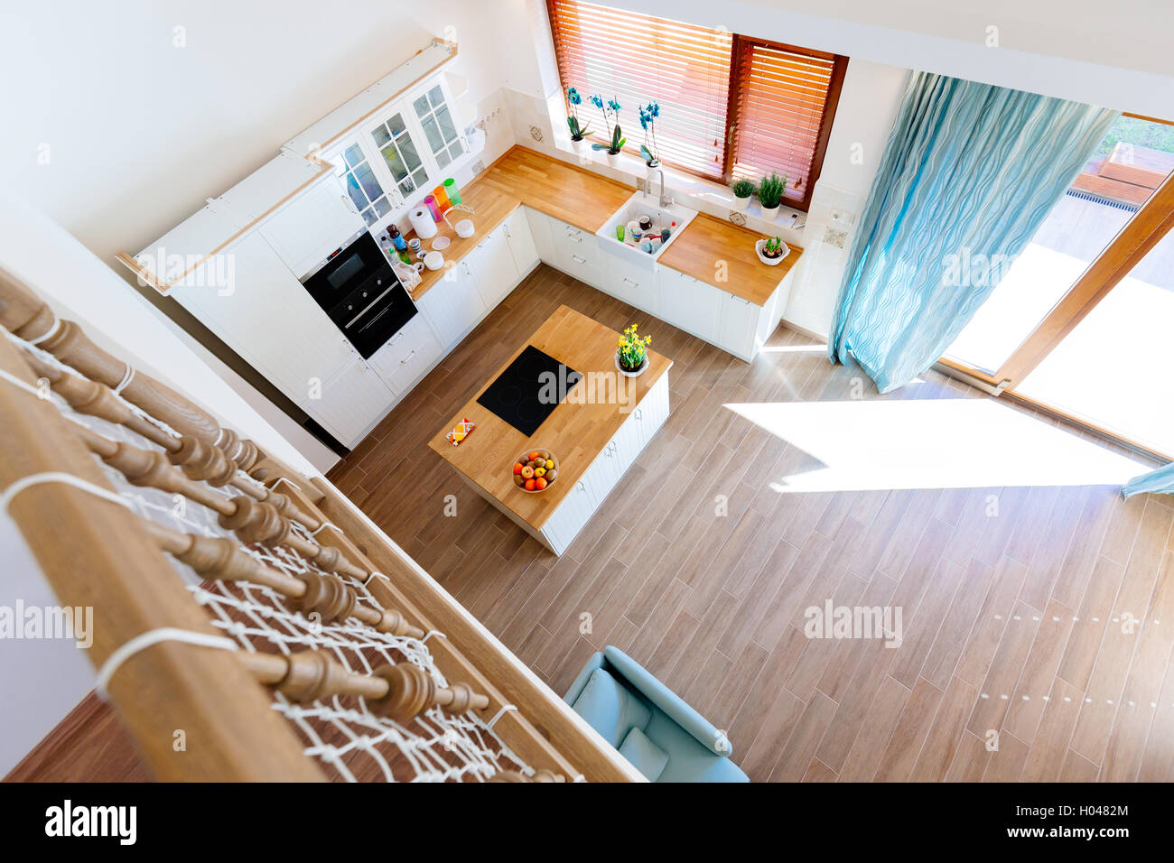 Modern equipped kitchen top view Stock Photo - Alamy
