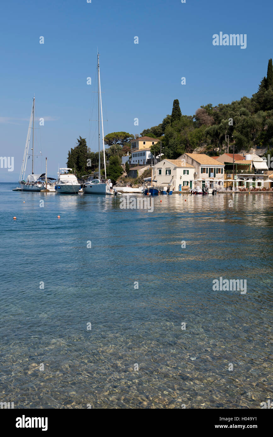 The picturesque harbour of Loggos on the East coast of Paxos, The ...