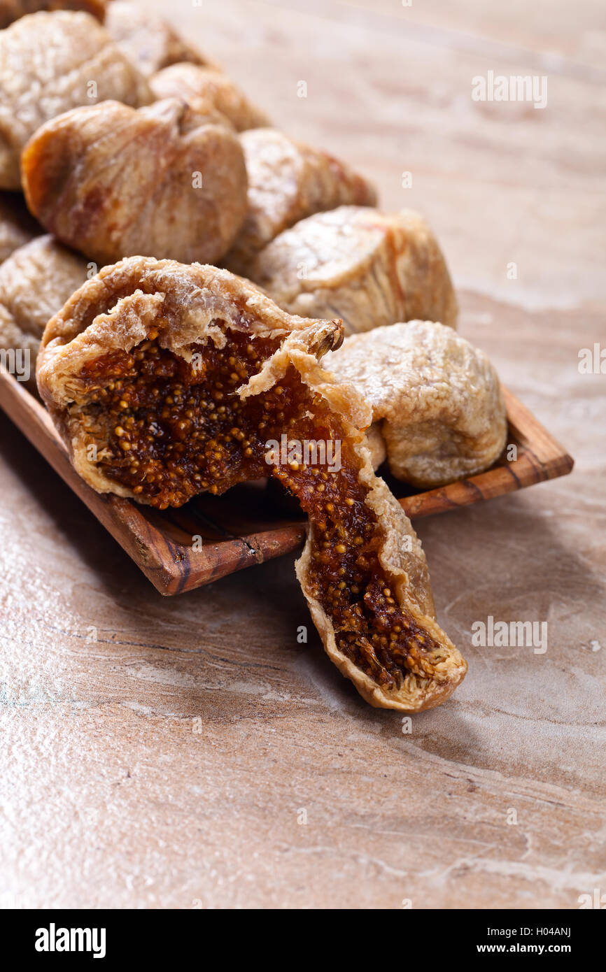 dried figs in a old wooden dish Stock Photo - Alamy
