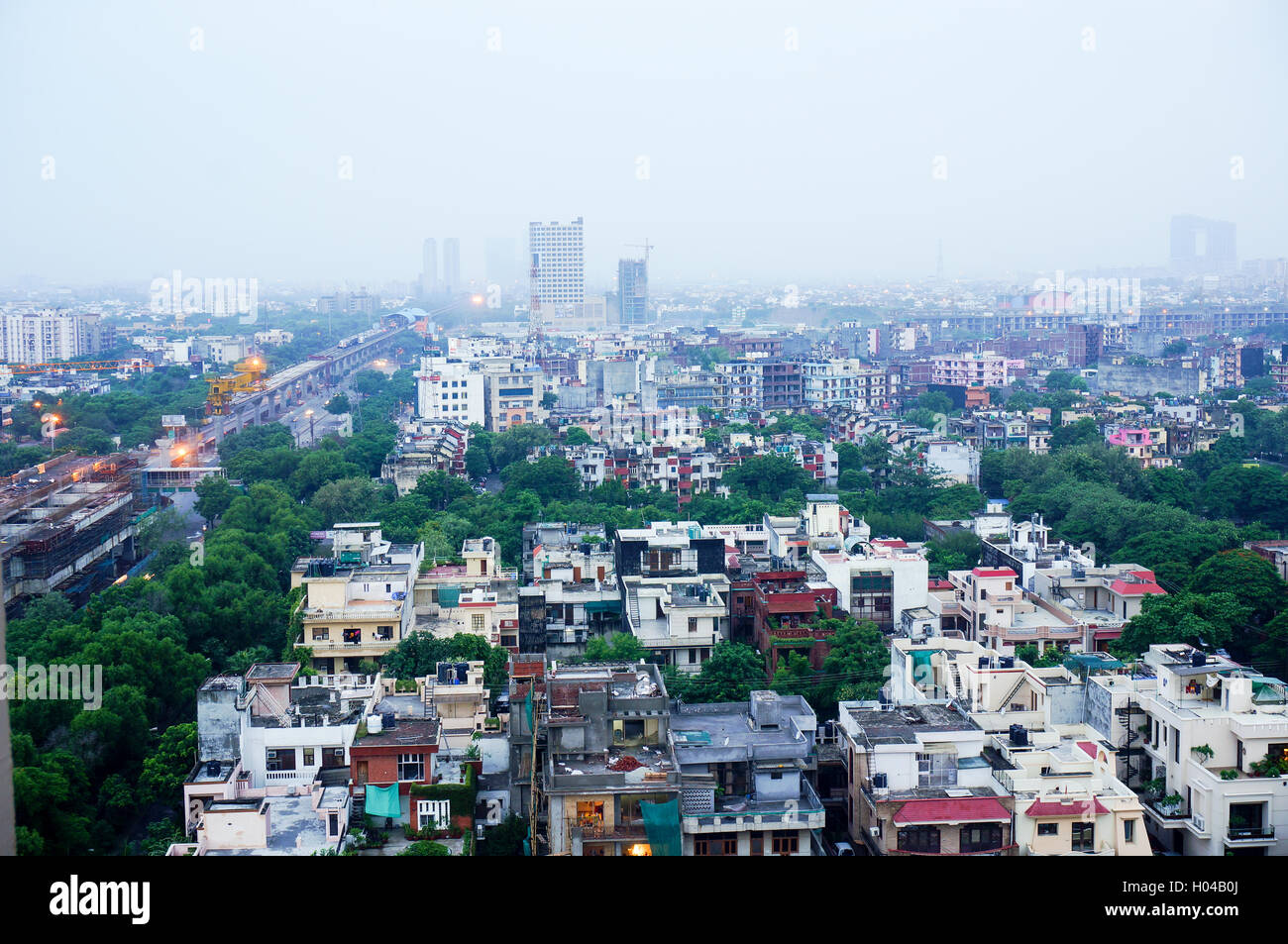 View of noida city at dawn from a skyscraper. Shows the many homes ...