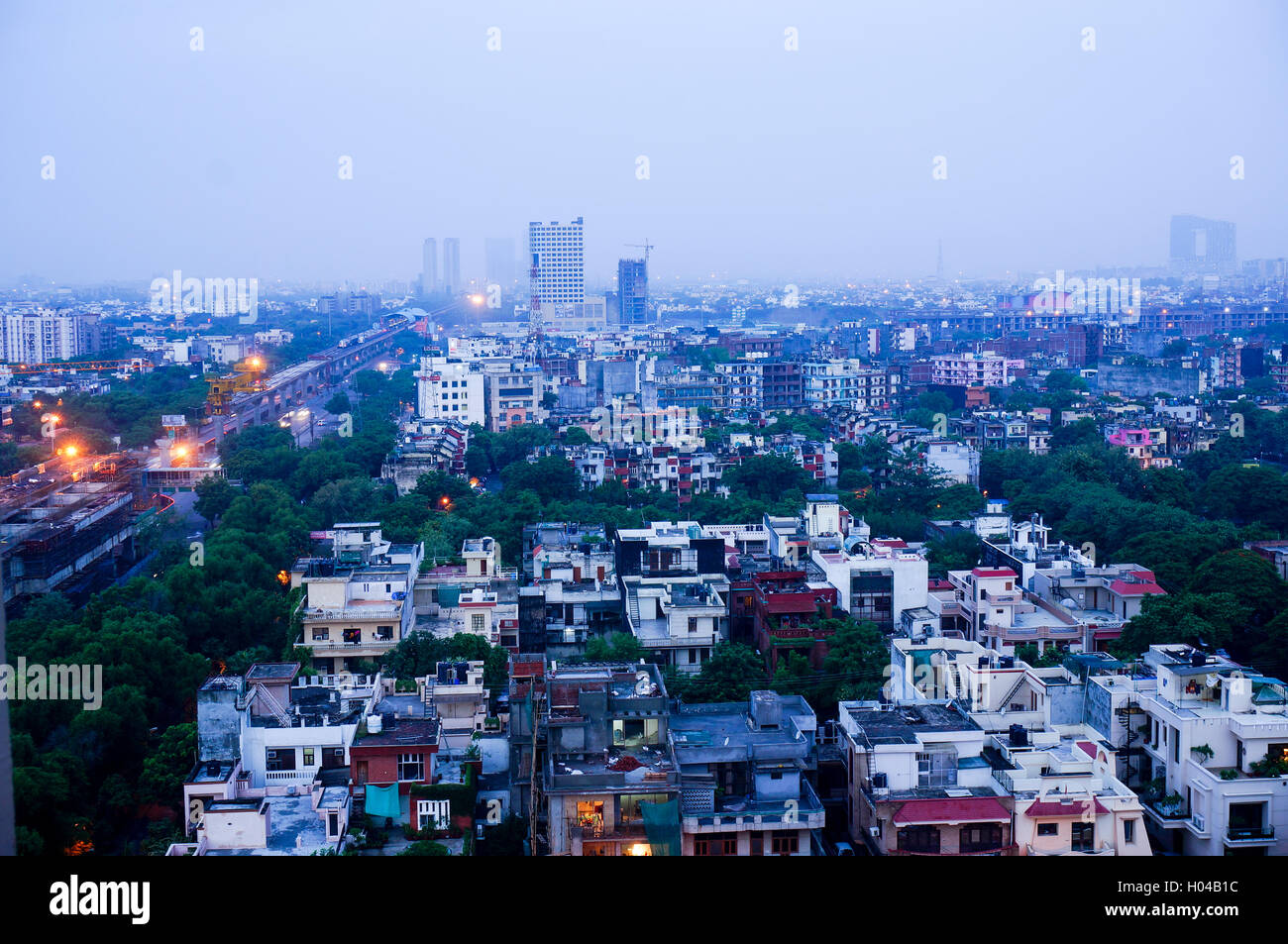 View of noida city at dawn from a skyscraper. Shows the many homes ...