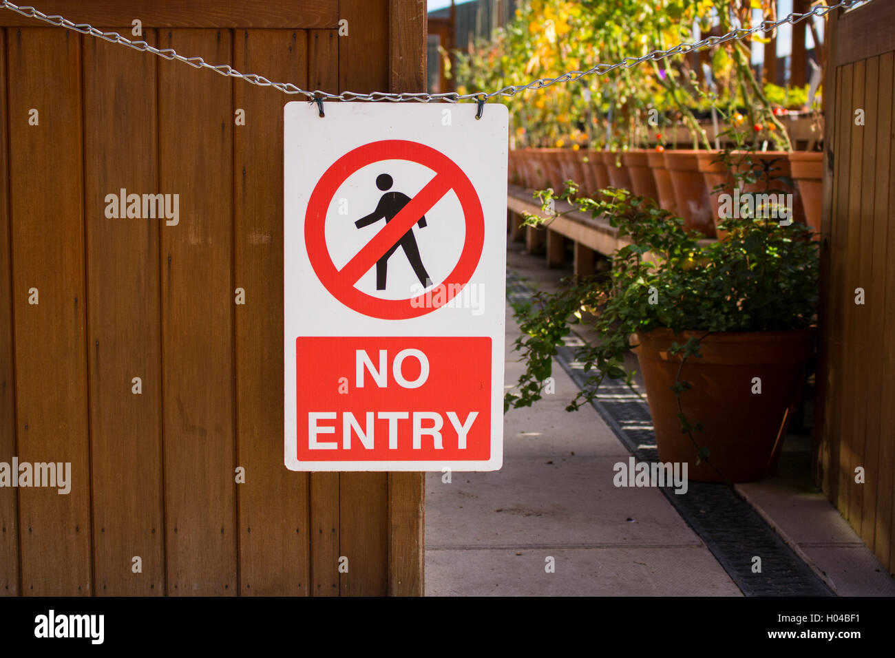 Hanging sign chain hi-res stock photography and images - Alamy