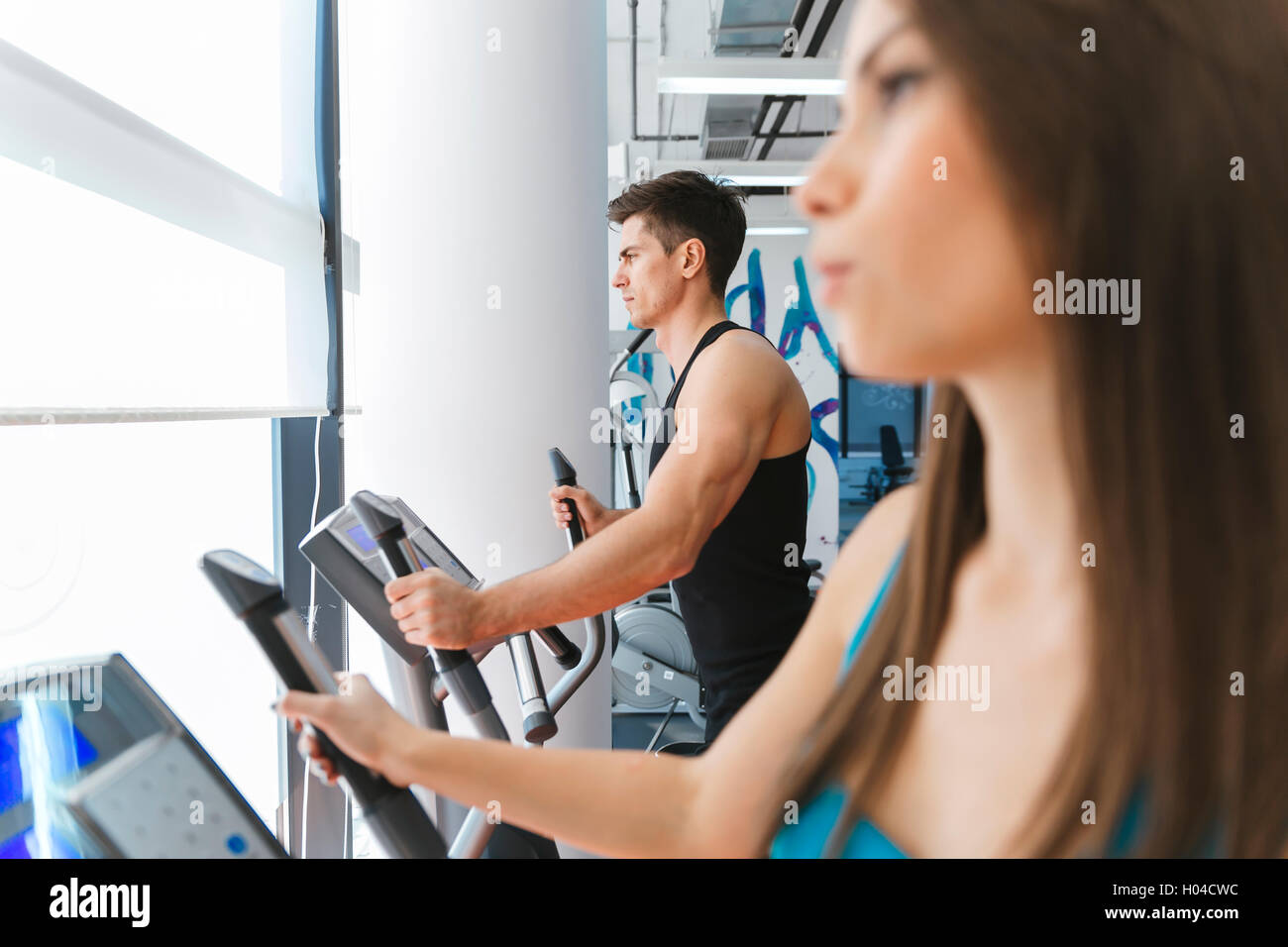 People exercising in gym to keep body in shape Stock Photo - Alamy