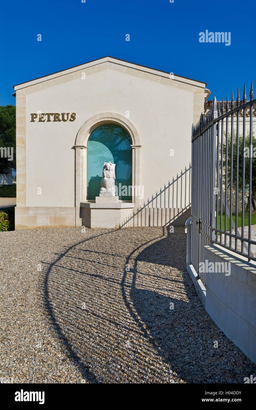 Chateau Petrus winery cellar cave with emblem 'Peter The Apostle Statue ...