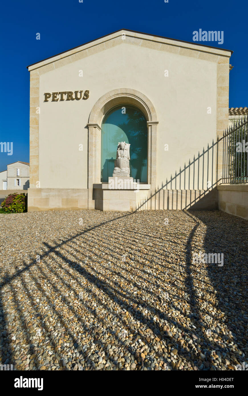 Chateau Petrus winery cellar cave with emblem 'Peter The Apostle Statue ...