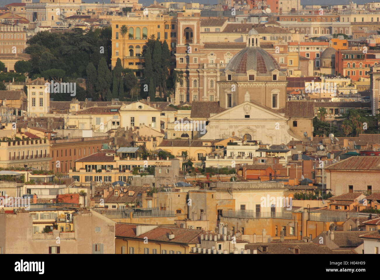 a beautiful view of Romes rooftops and monuments form a distance, from ...