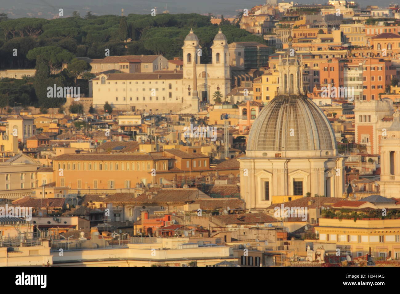 a beautiful view of Romes rooftops and monuments form a distance, from ...