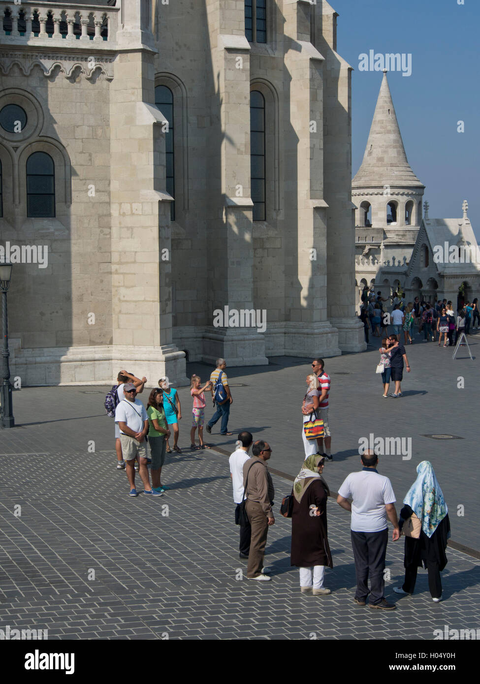 Muslim tourists by Matthias Church in Buda.Budapest.Hungary Stock Photo ...