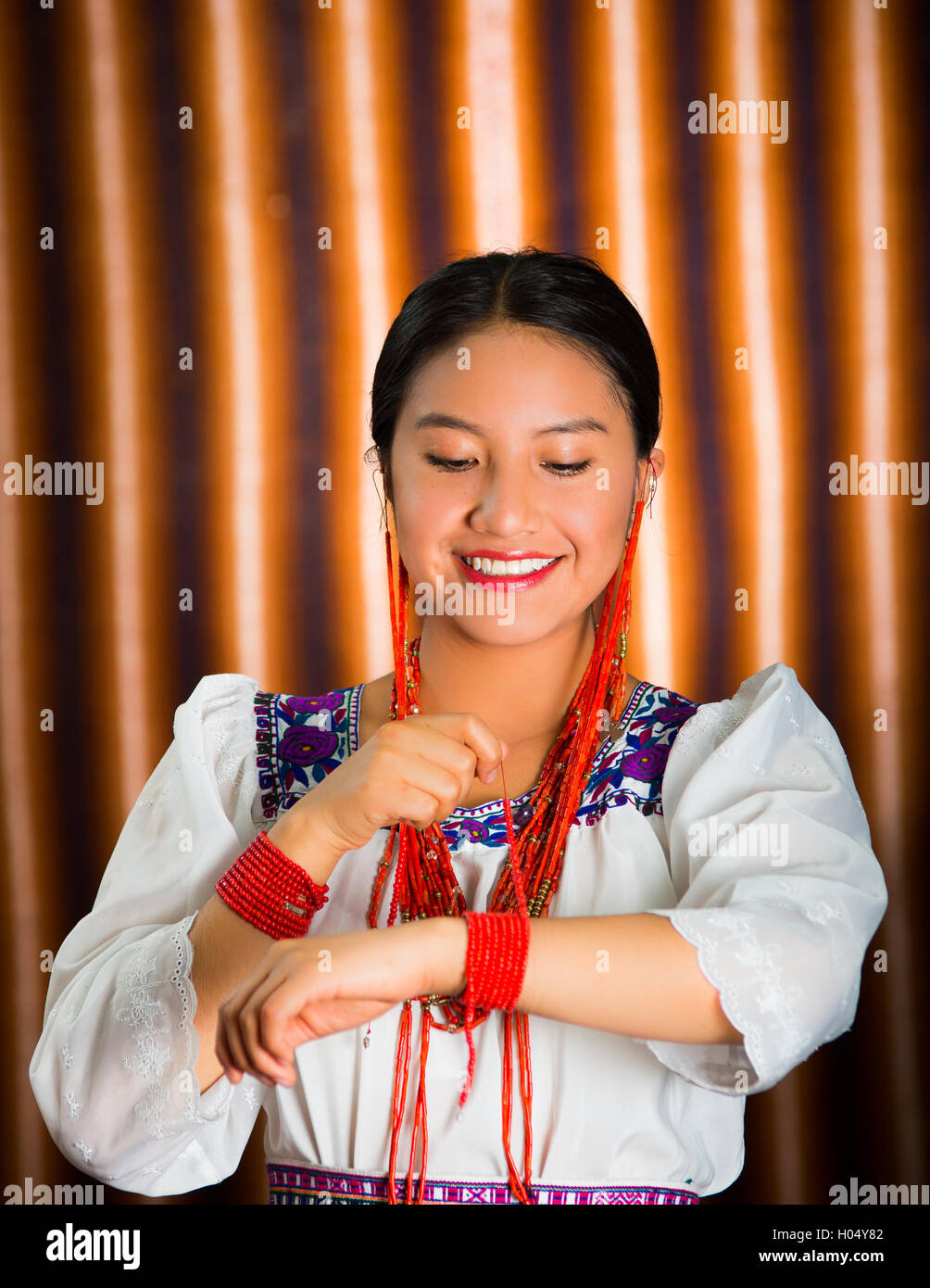 Beautiful Hispanic Model Wearing Andean Traditional Clothing Smiling
