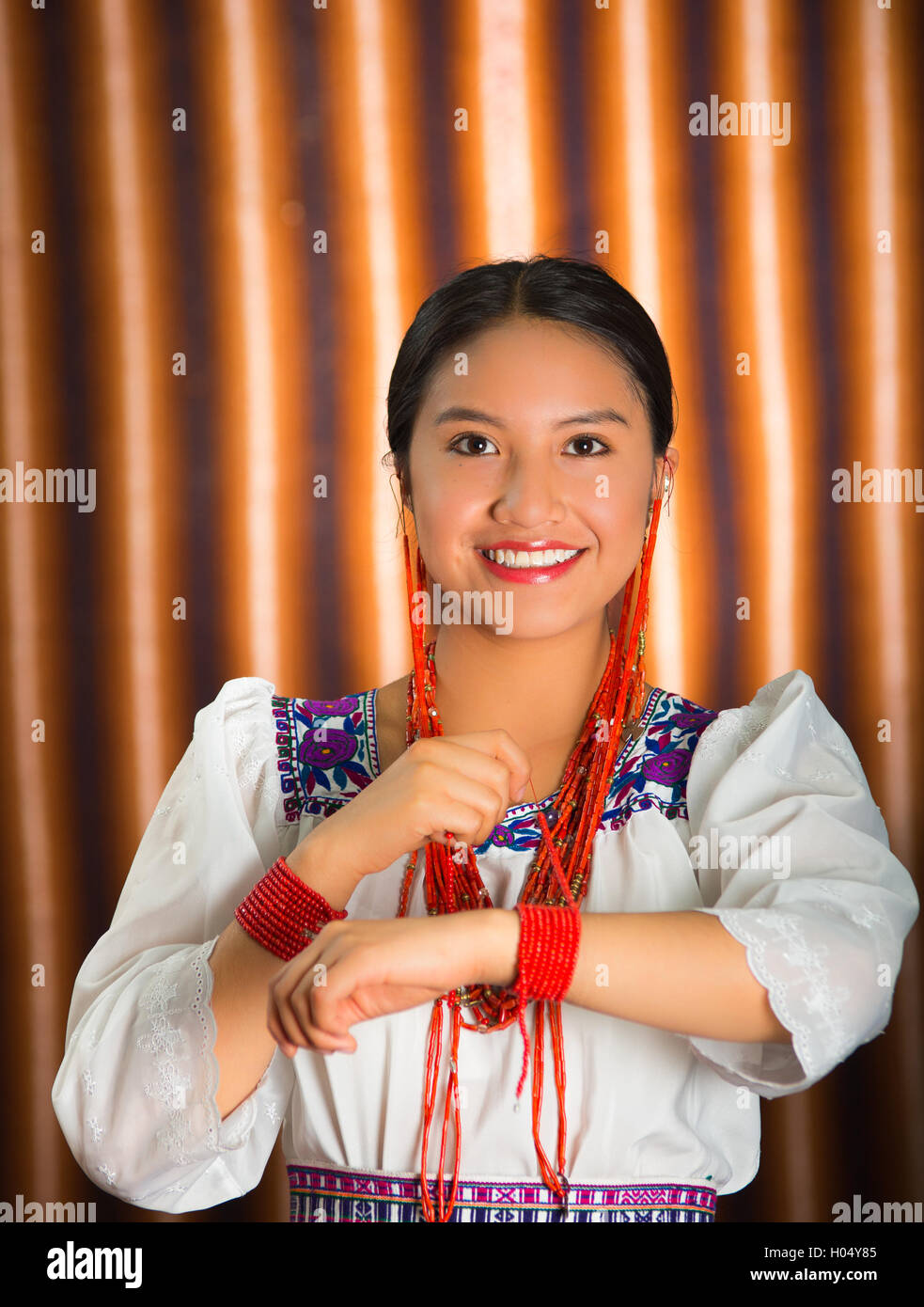 Beautiful Hispanic Model Wearing Andean Traditional Clothing Smiling