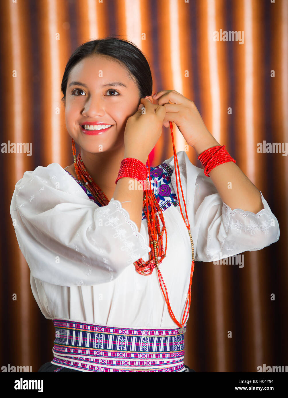 Beautiful Hispanic Model Wearing Andean Traditional Clothing Smiling