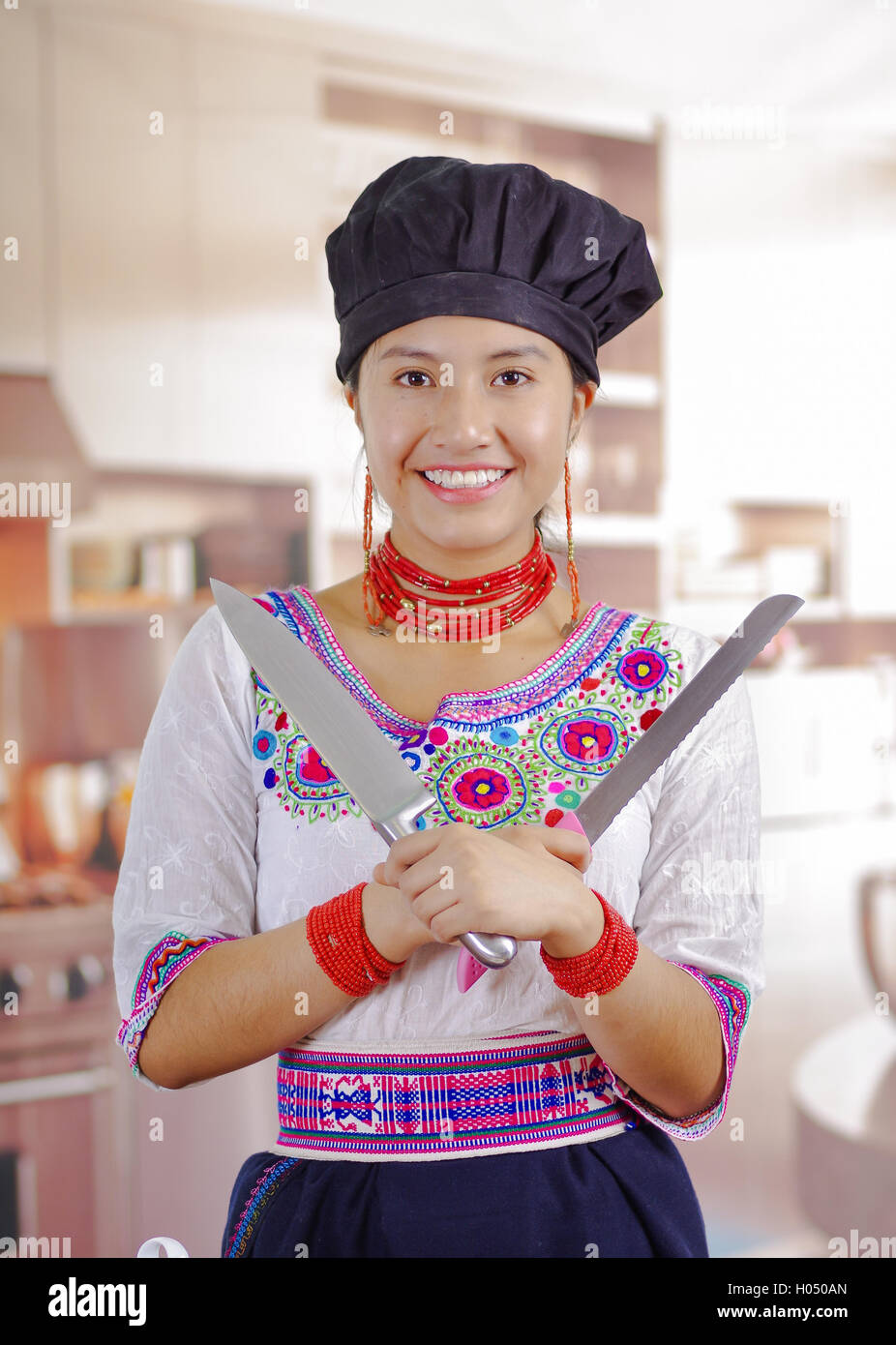 Woman holding large kitchen knife hi-res stock photography and images ...