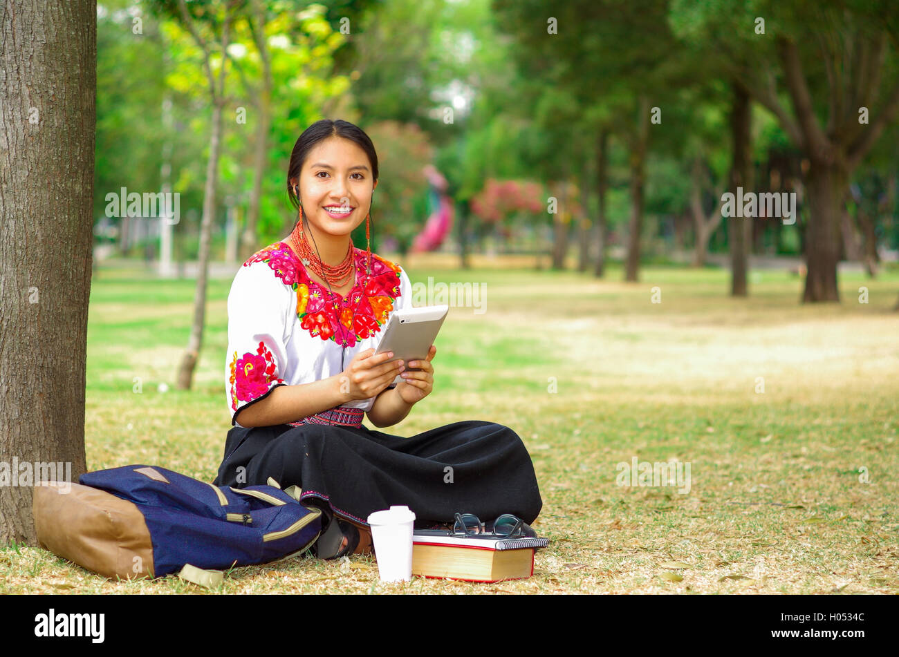 Young Woman Wearing Traditional Andean Skirt And Blouse With Matching