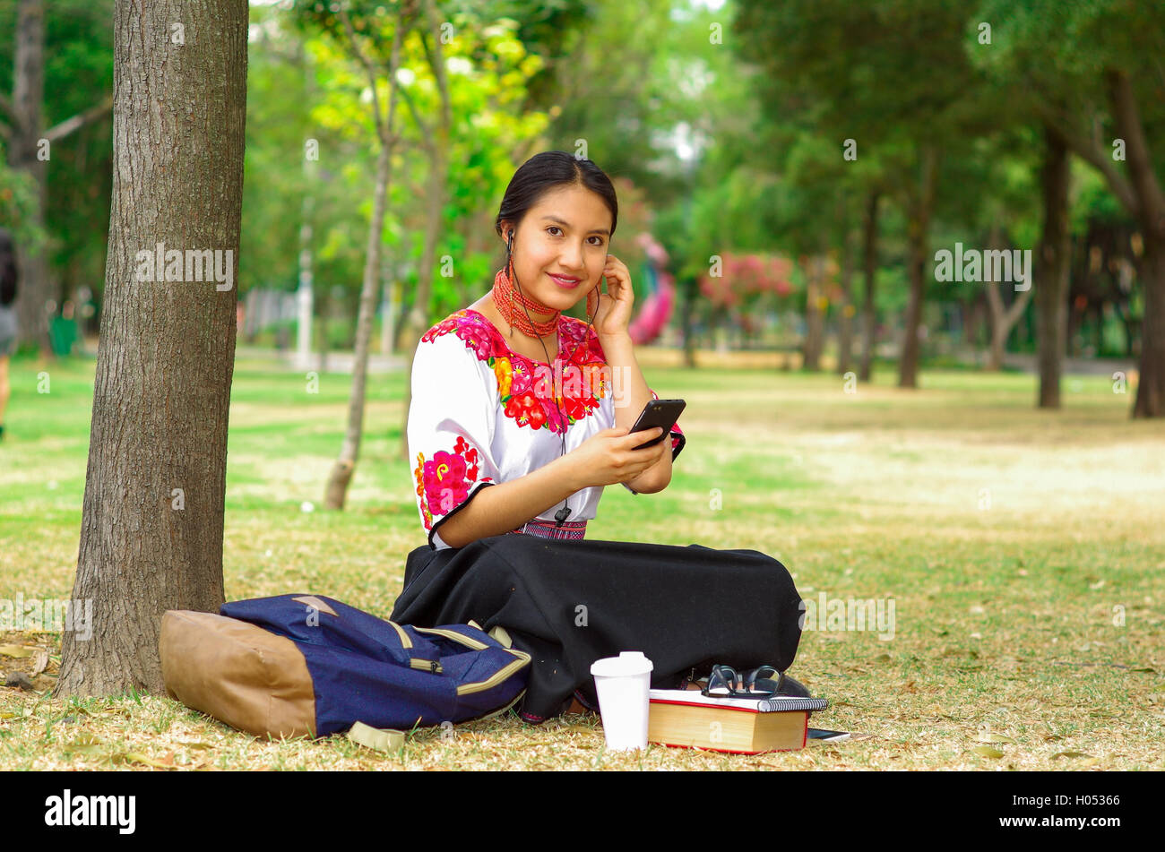 Young Woman Wearing Traditional Andean Skirt And Blouse With Matching
