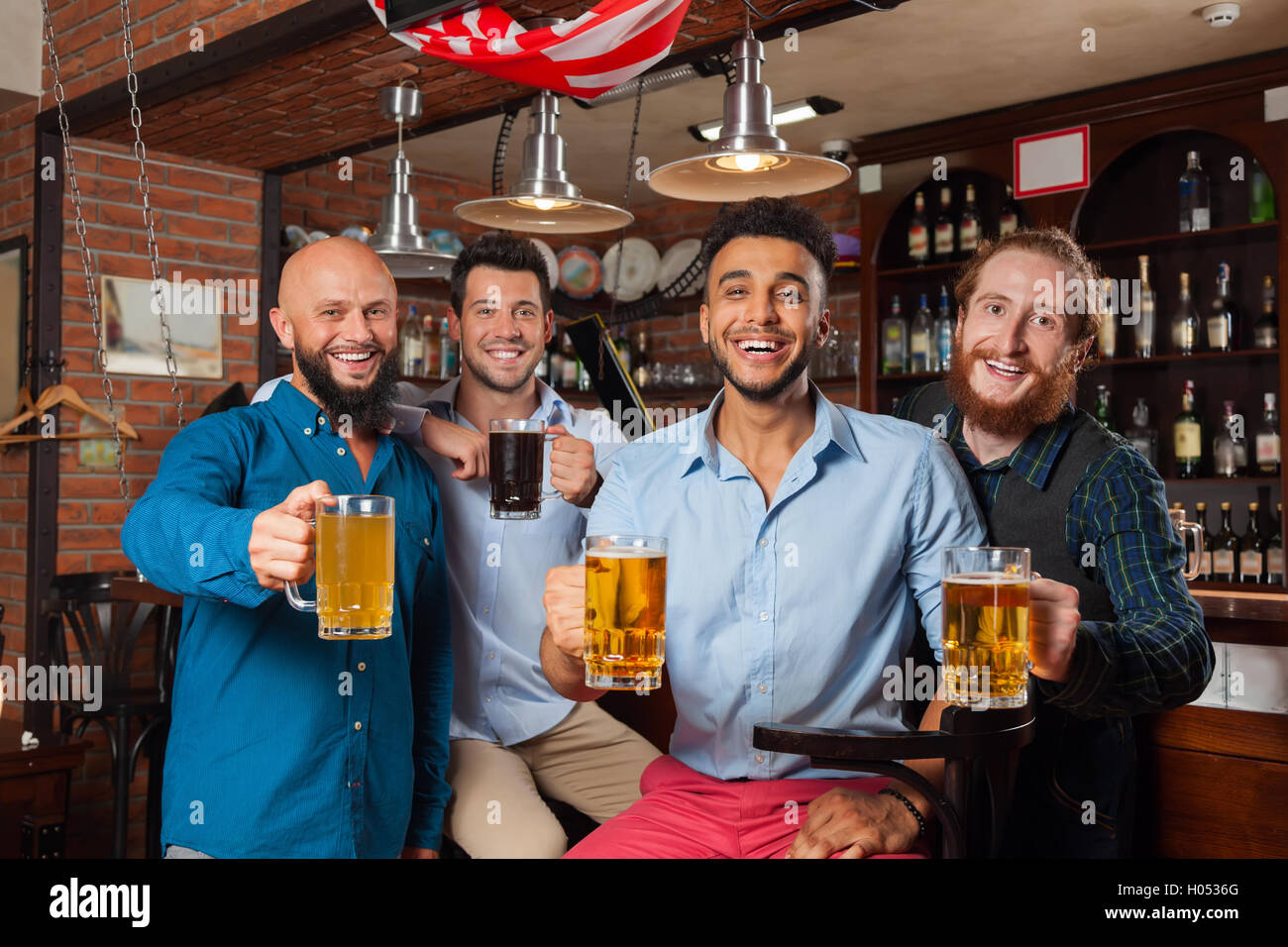 Man Group In Bar Clink Glasses Toasting, Drinking Beer Hold Mugs, Mix ...