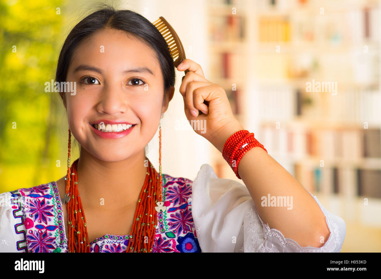 Beautiful Hispanic Woman Wearing White Blouse With Colorful Embroidery