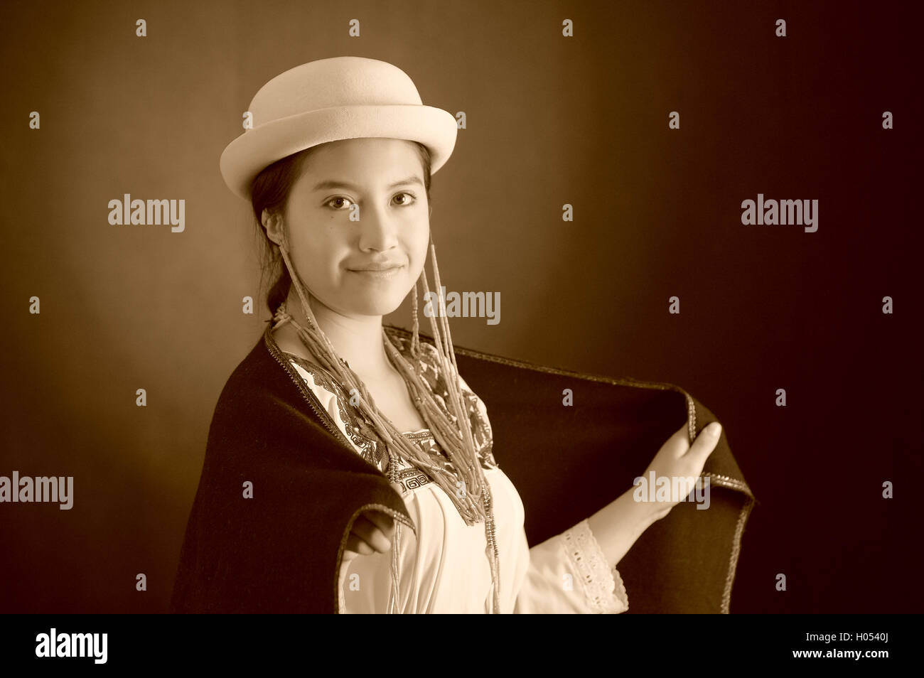 Beautiful Hispanic Model Wearing Andean Traditional Clothing Holding