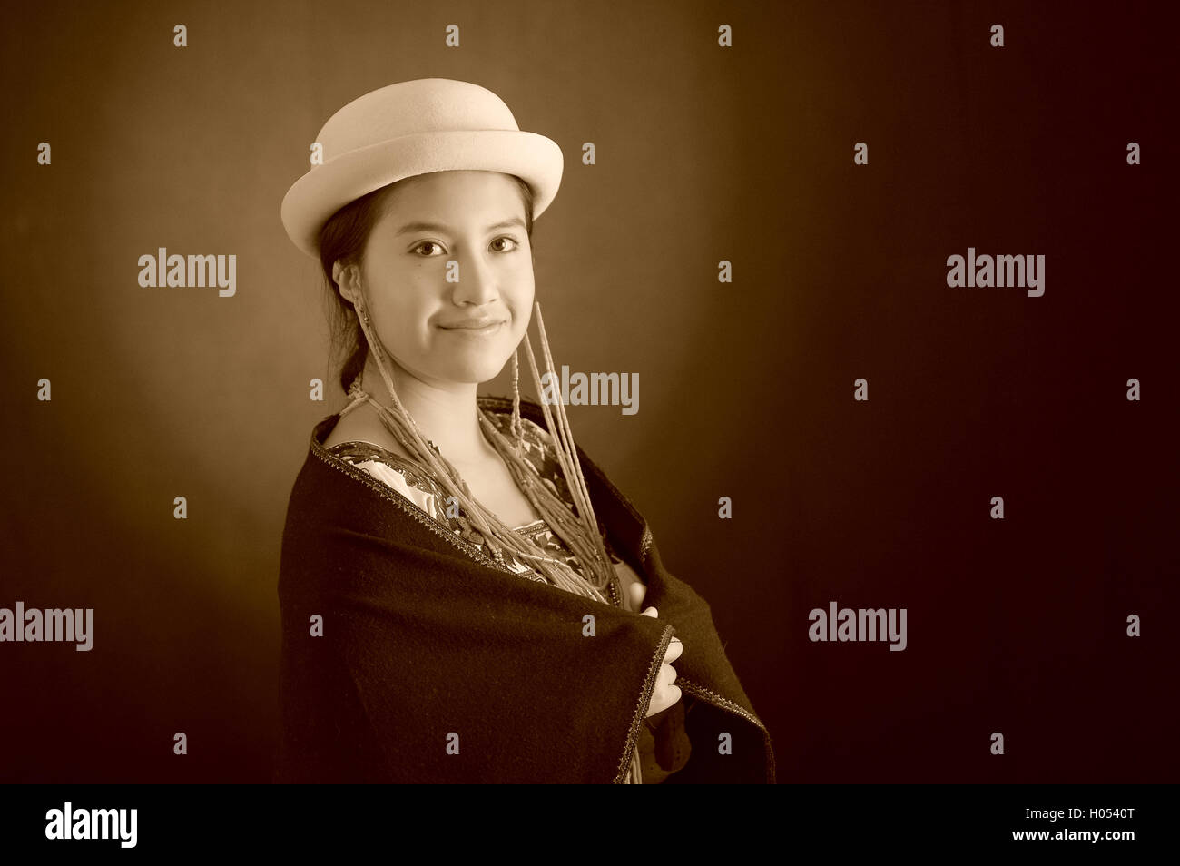 Beautiful Hispanic Model Wearing Andean Traditional Clothing Holding