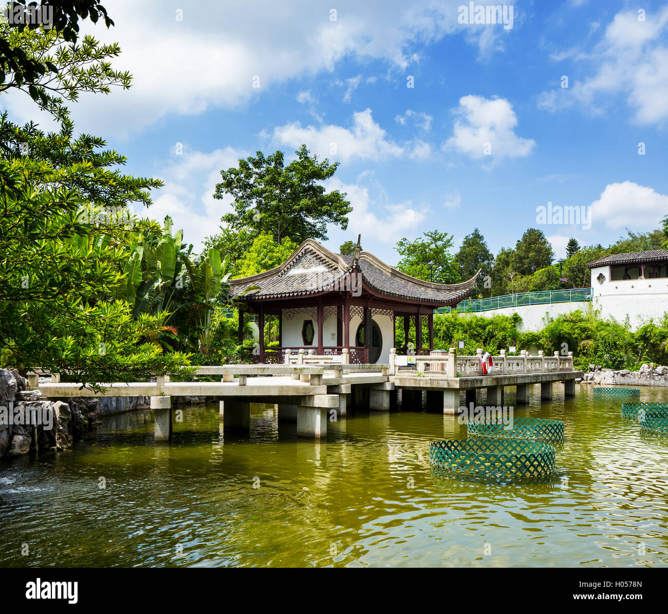 Traditional chinese architecture with lake Stock Photo - Alamy